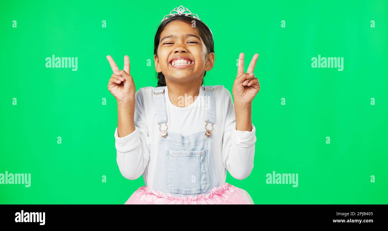 Peace, fun and hand gesture with a girl on a green screen background in ...