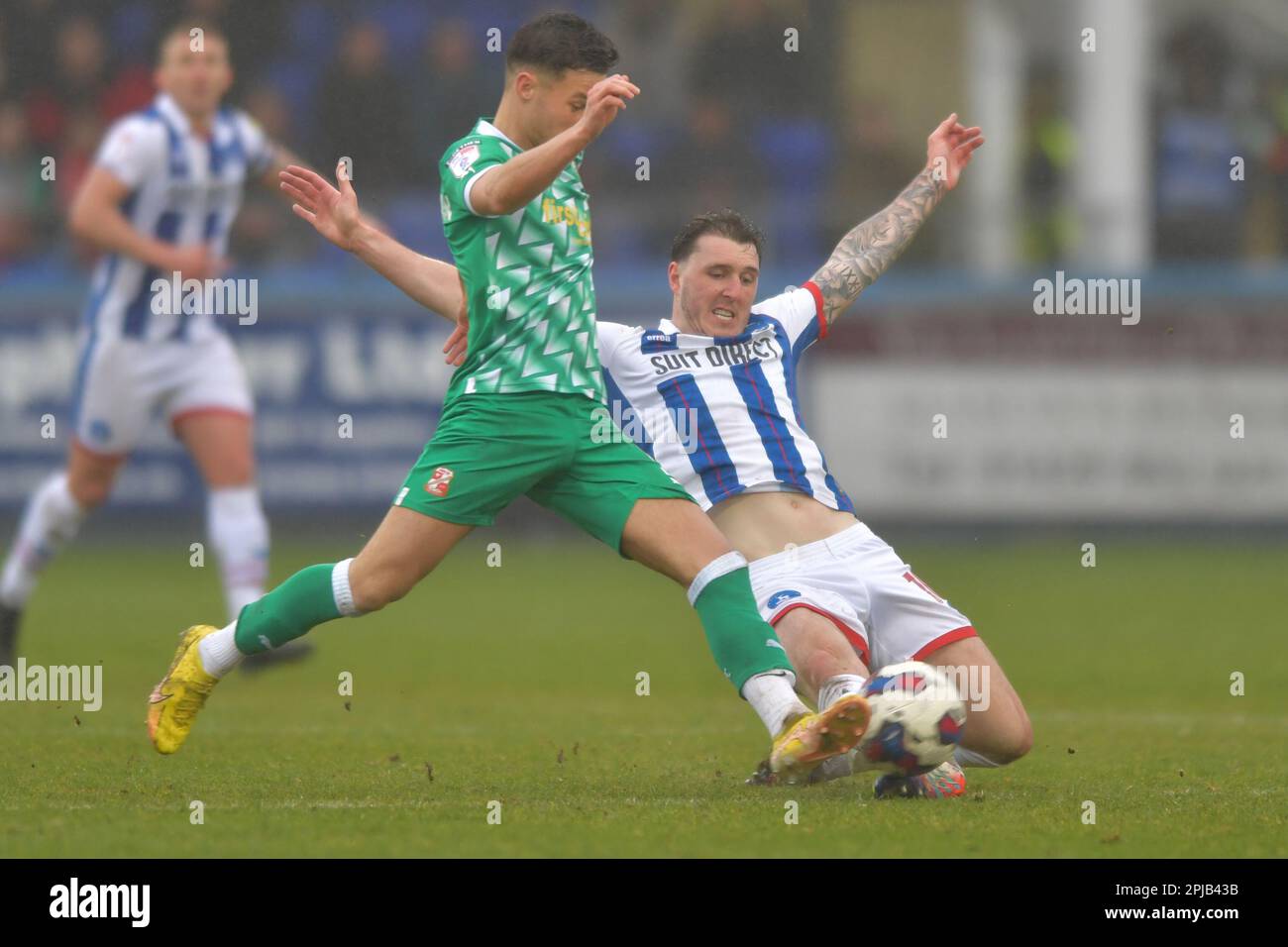 Hartlepool United's Callum Cooke looks to win the midfield battle ...