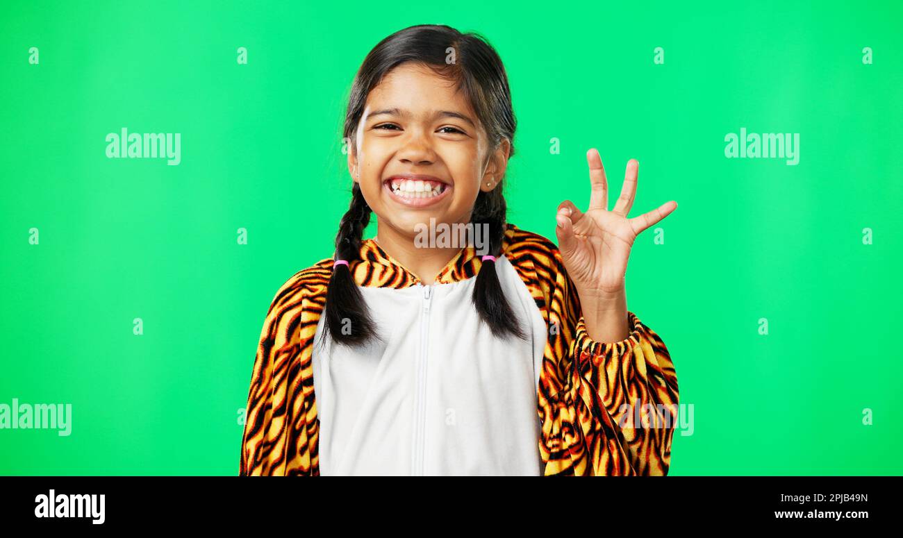 Children, perfect and hand gesture with a girl on a green screen ...