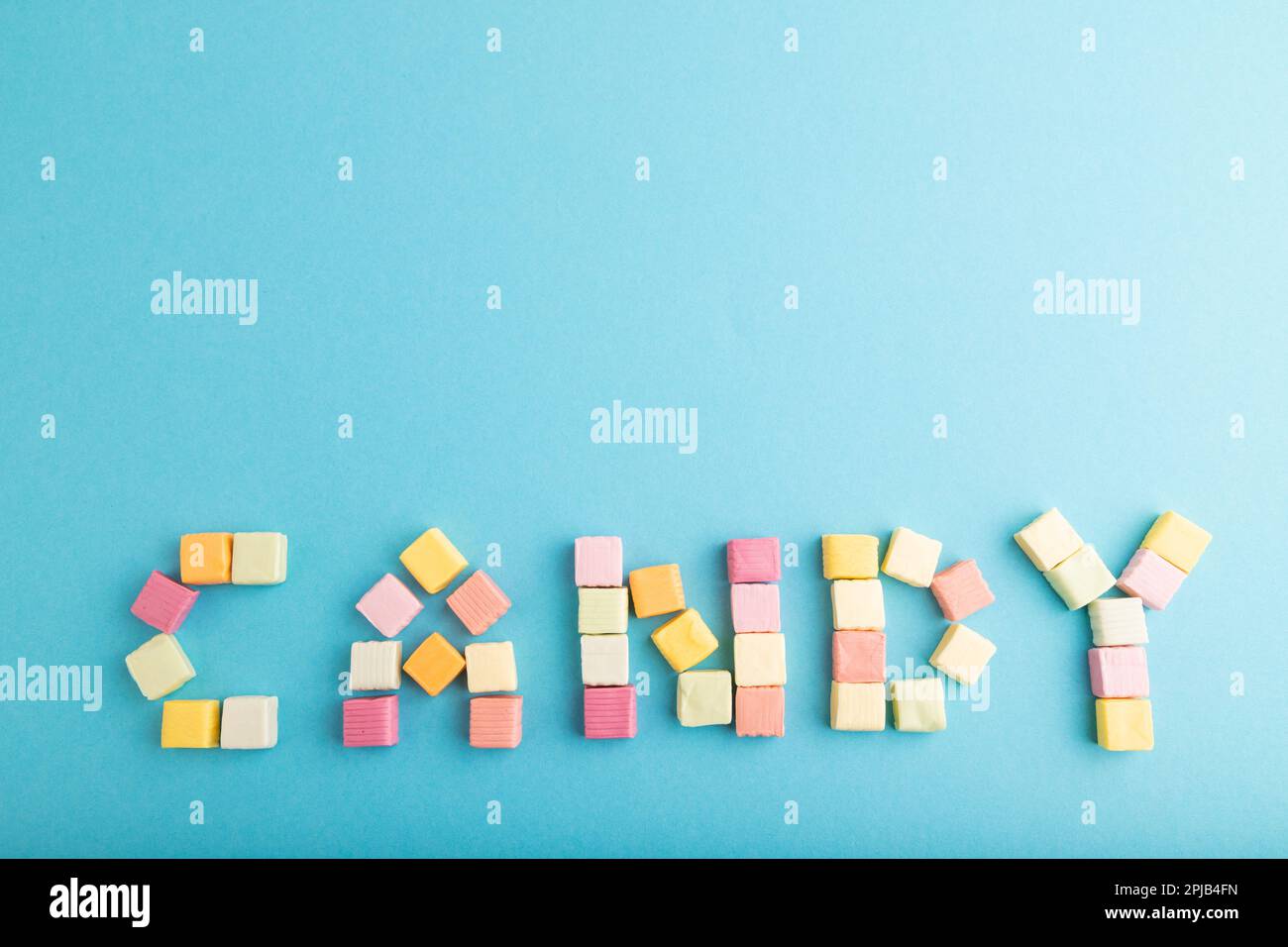 The inscription "candy" laid out with various fruit jelly chewing ...