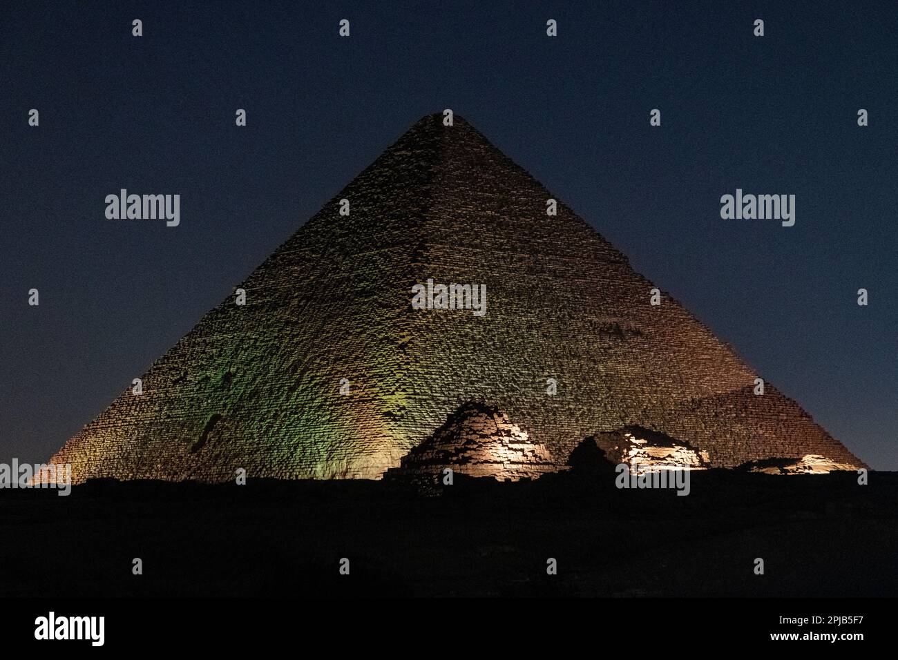 The Pyramids of Giza lit up with lights for the light and sound show at ...
