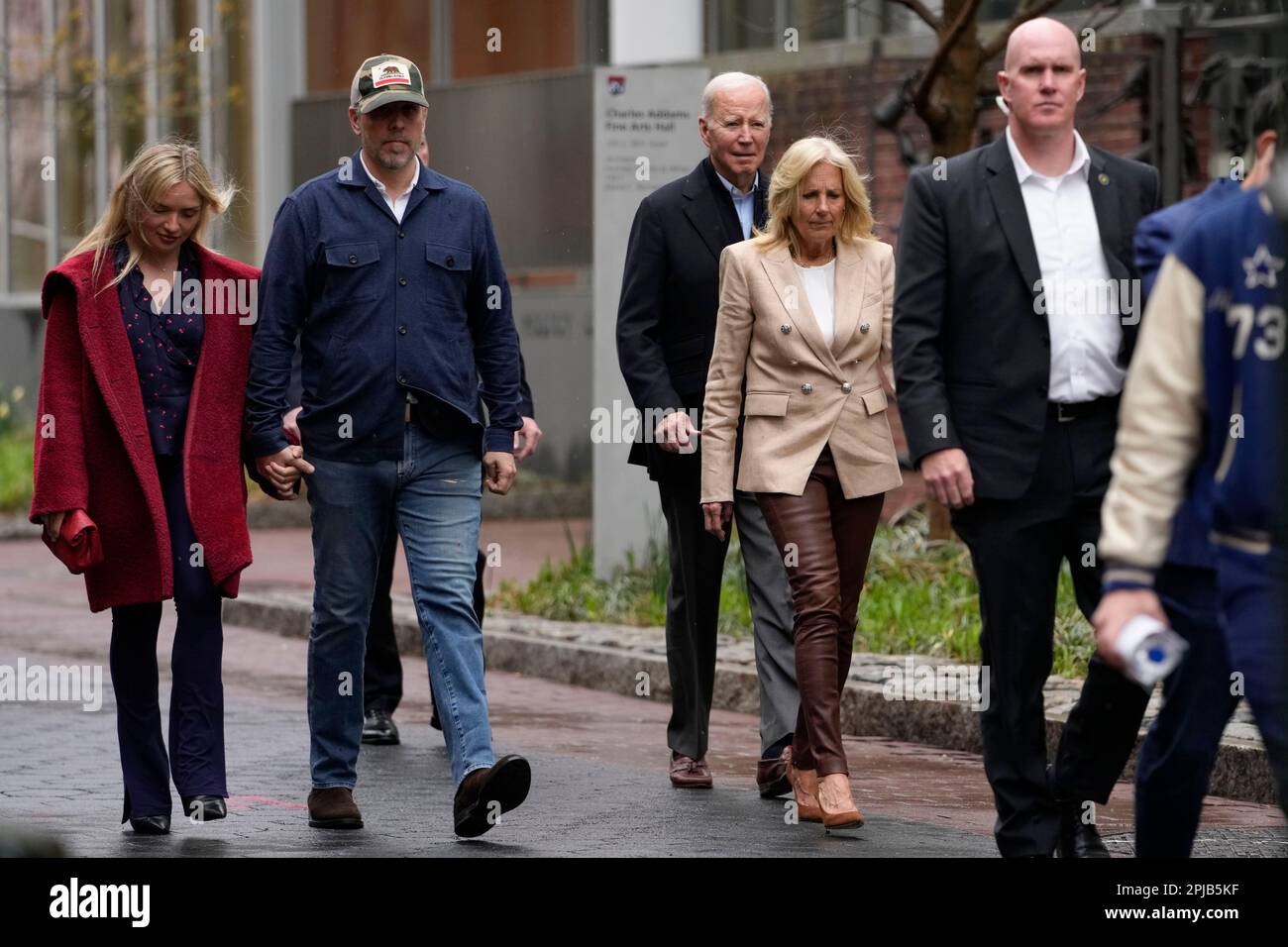 President Joe Biden and first lady Jill Biden walk to their motorcade ...