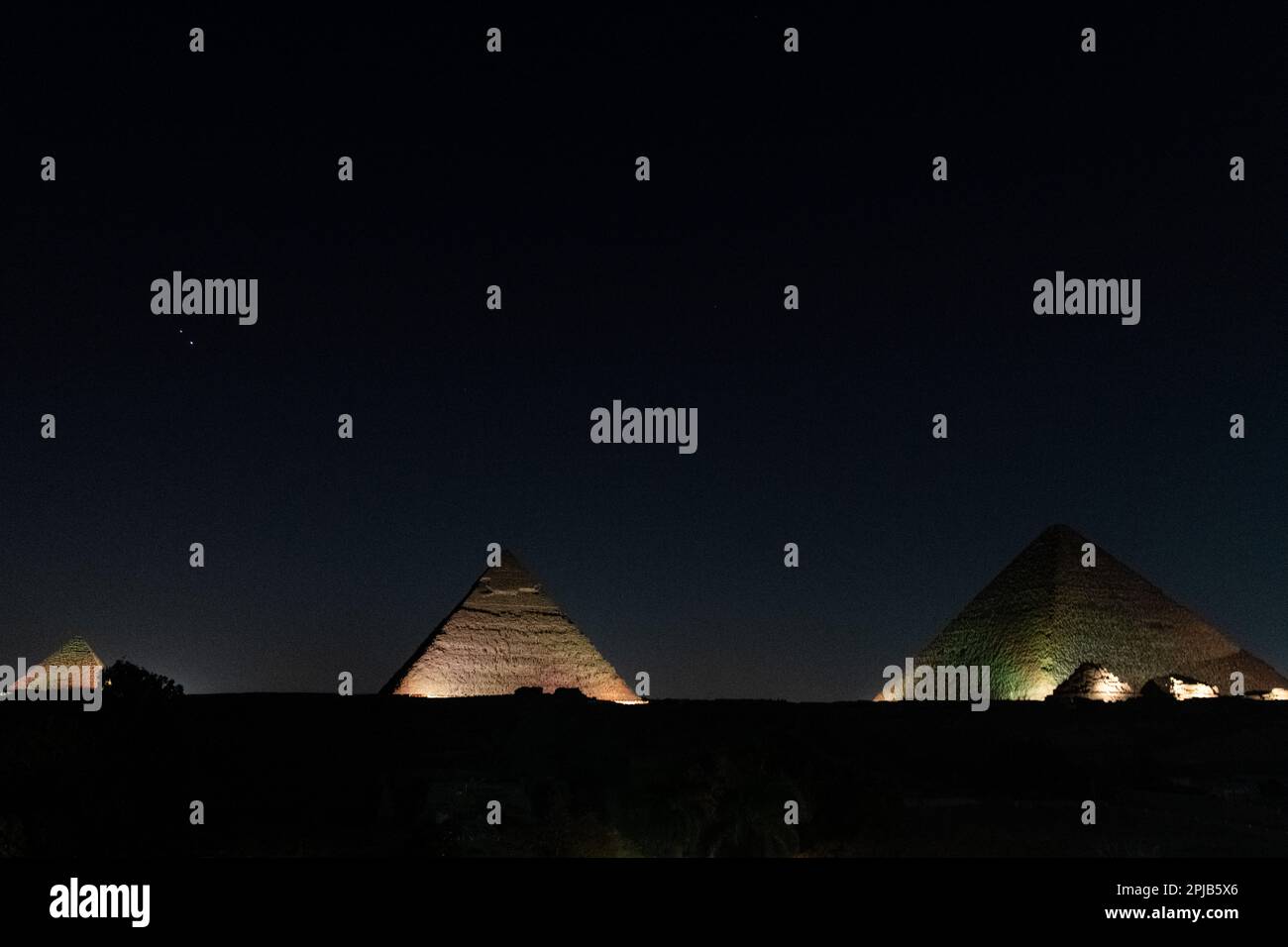 The Pyramids of Giza lit up with lights for the light and sound show at ...