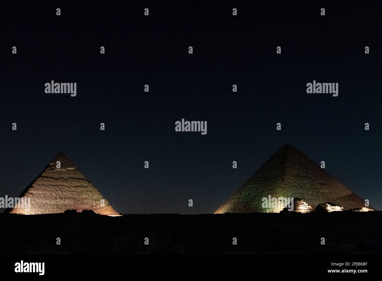 The Pyramids of Giza lit up with lights for the light and sound show at ...