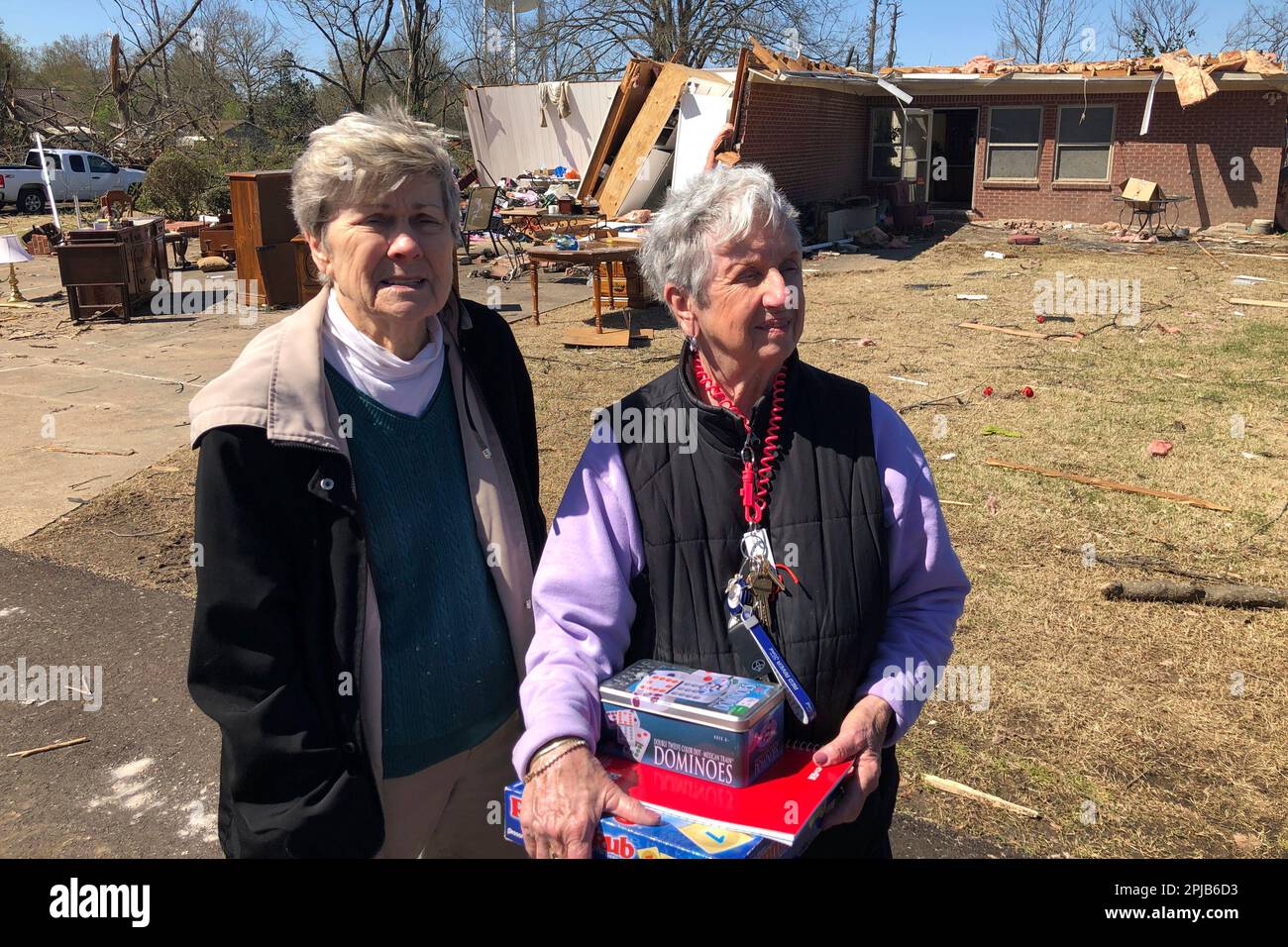From left, Betty Ransom speaks with a reporter while standing in front ...