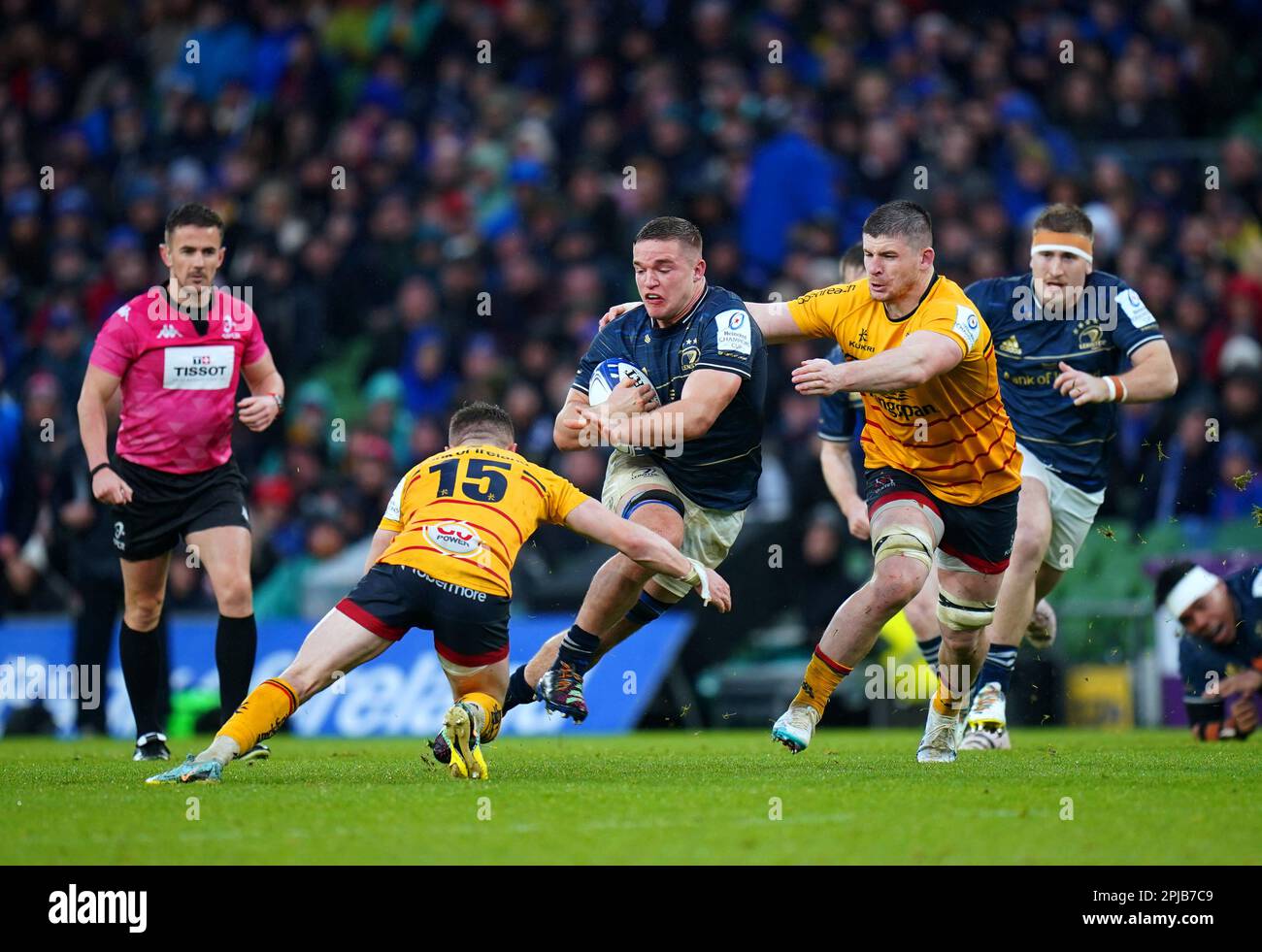Leinster Rugby's Scott Penny (centre) is tackled by Ulster Rugby's ...