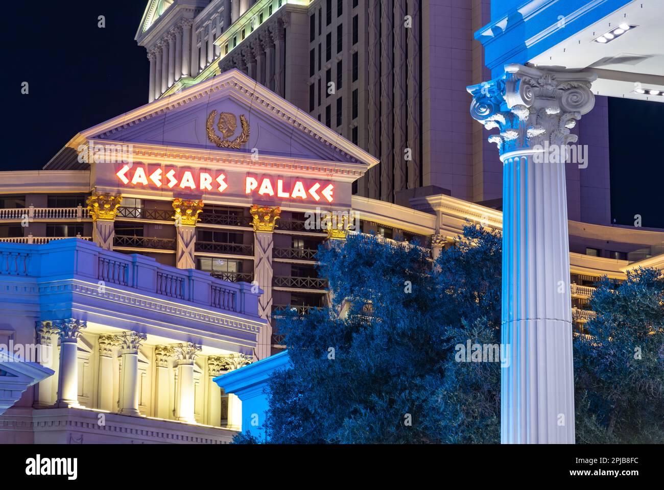 A picture of the Caesars Palace at night Stock Photo - Alamy