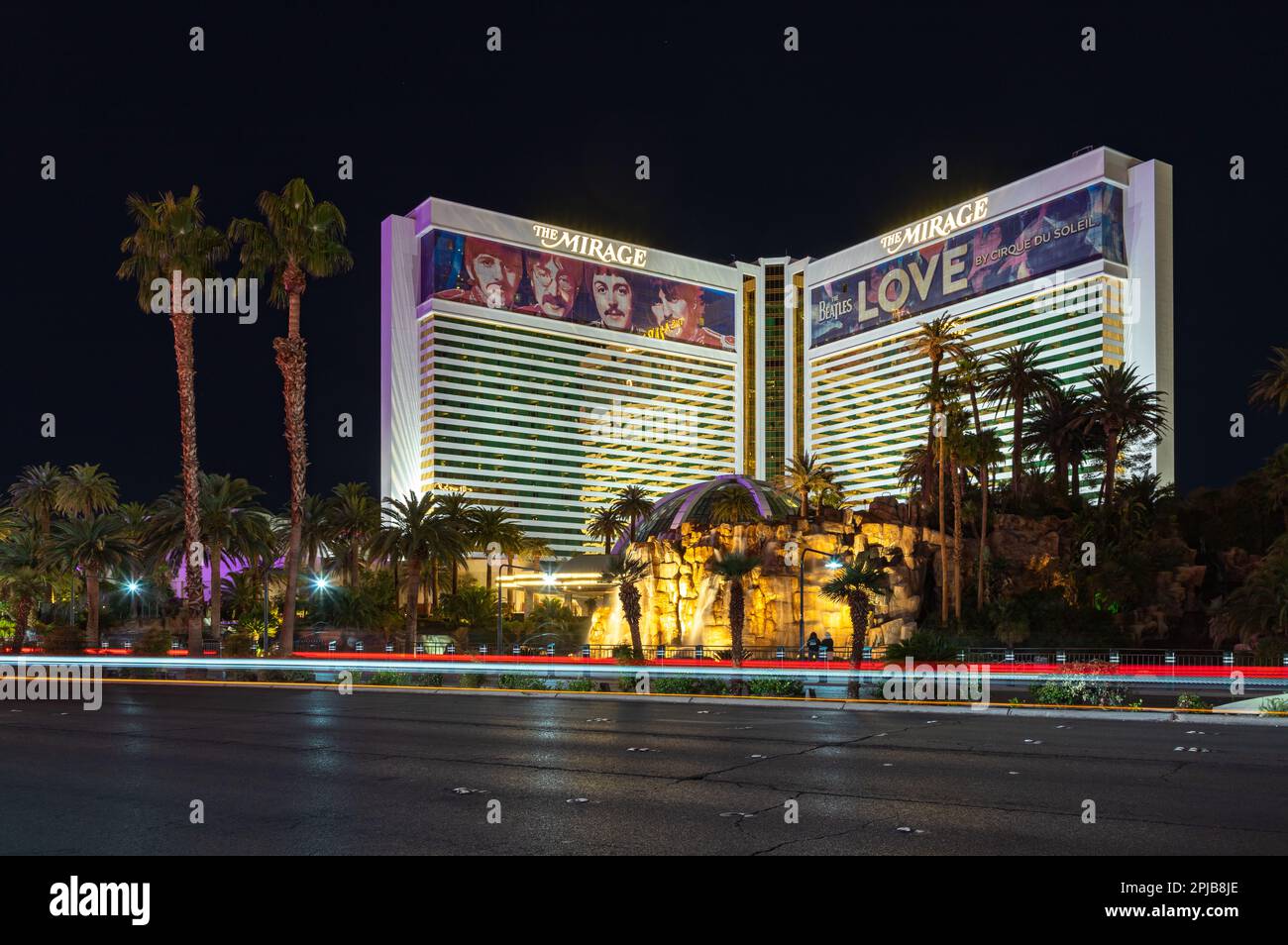 A picture of the Mirage at night, with a large ad of the show Love by ...