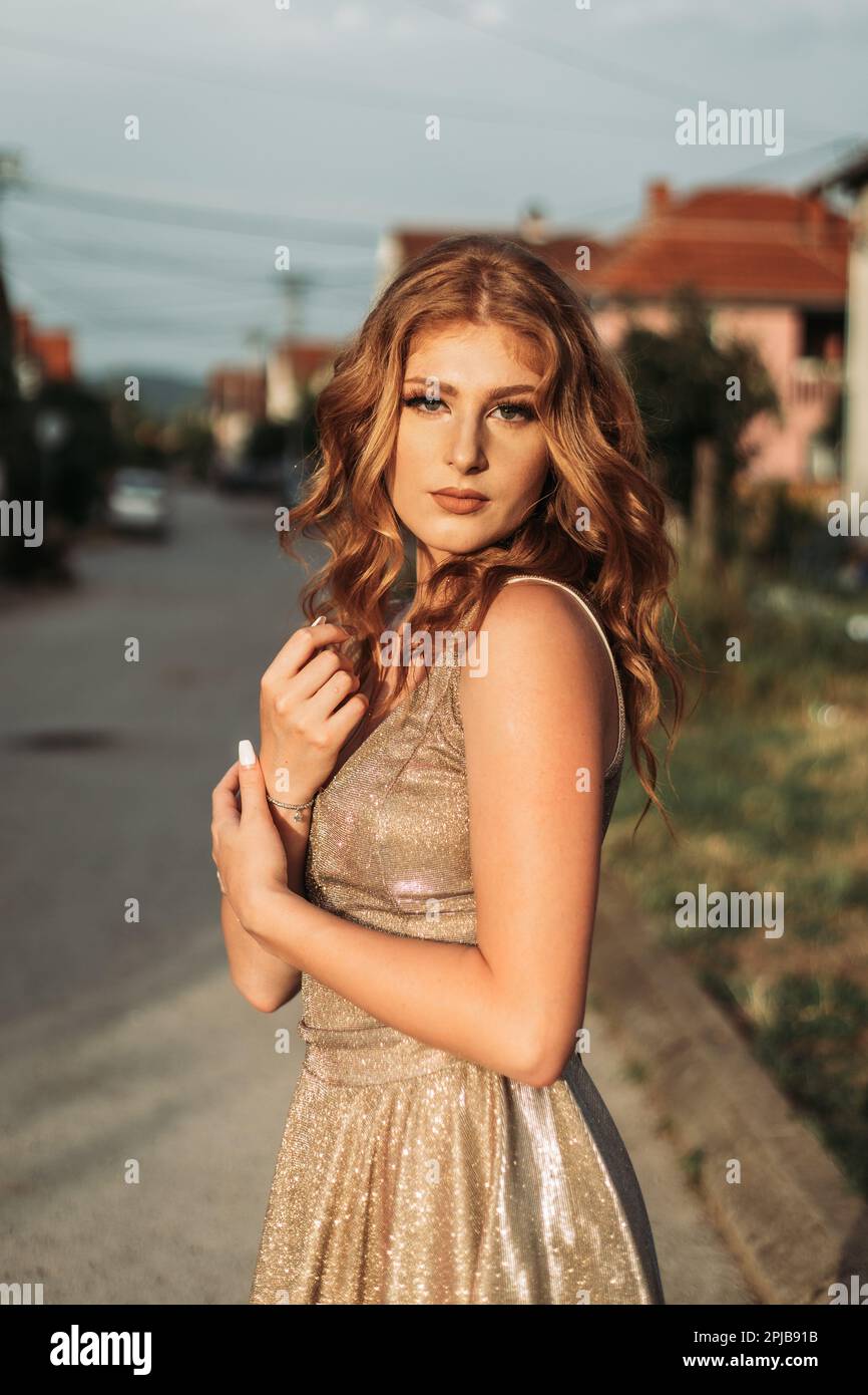 Beautiful Ginger Teen Girl In Glamorous Golden Dress Ready For Her