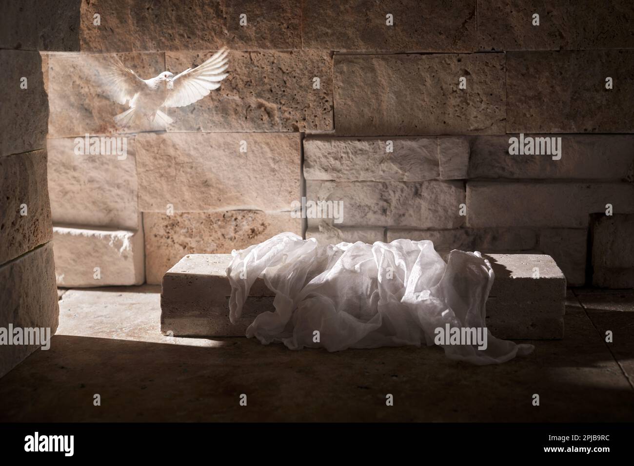 Jesus Christ crucifixion death and resurrection and easter dove flying in a stone tomb Stock ...