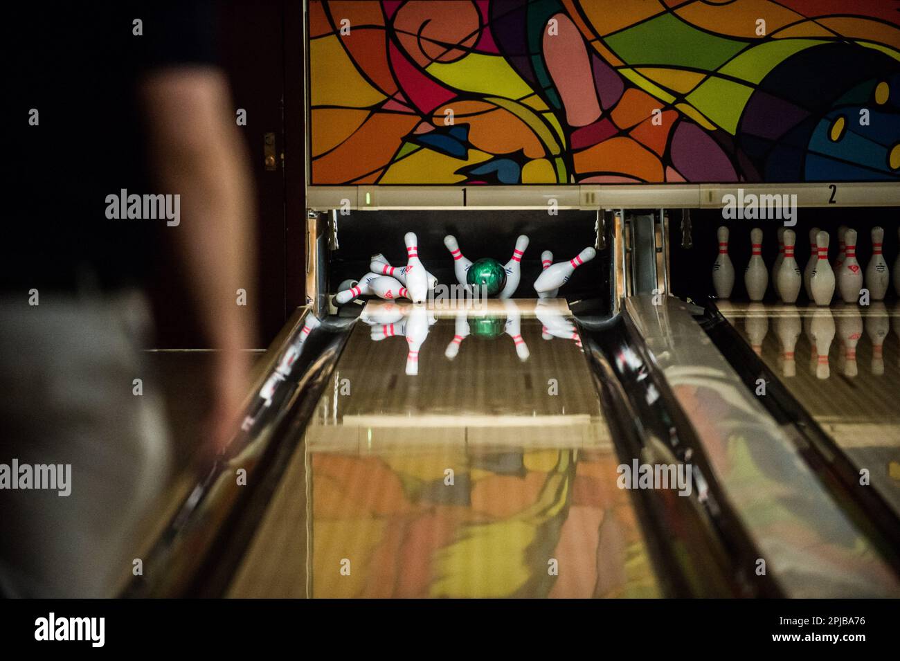 Bowling ball crashing into pins in OHIO USA Stock Photo - Alamy