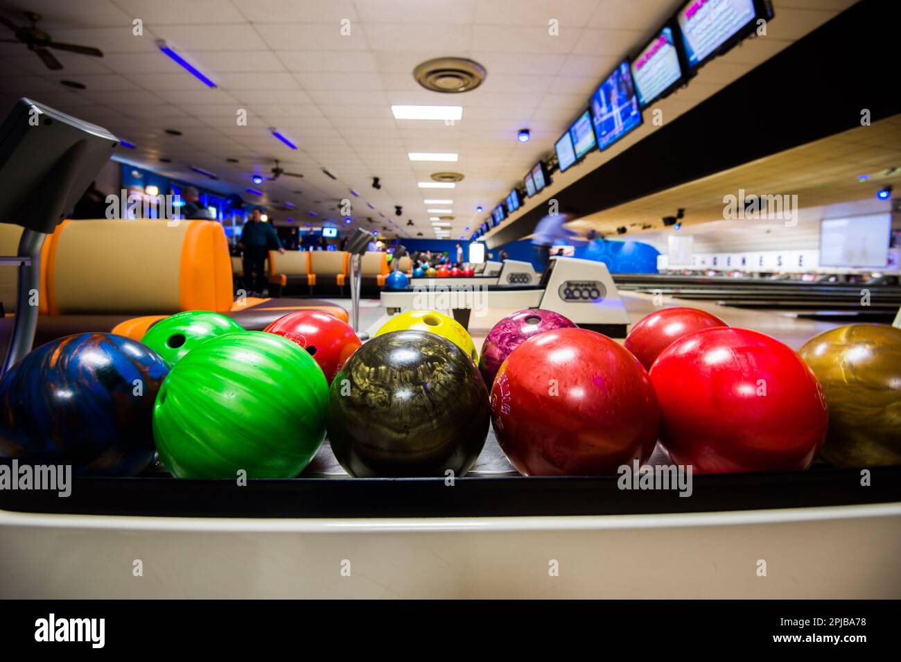 Bowling ball crashing into pins in OHIO USA Stock Photo - Alamy