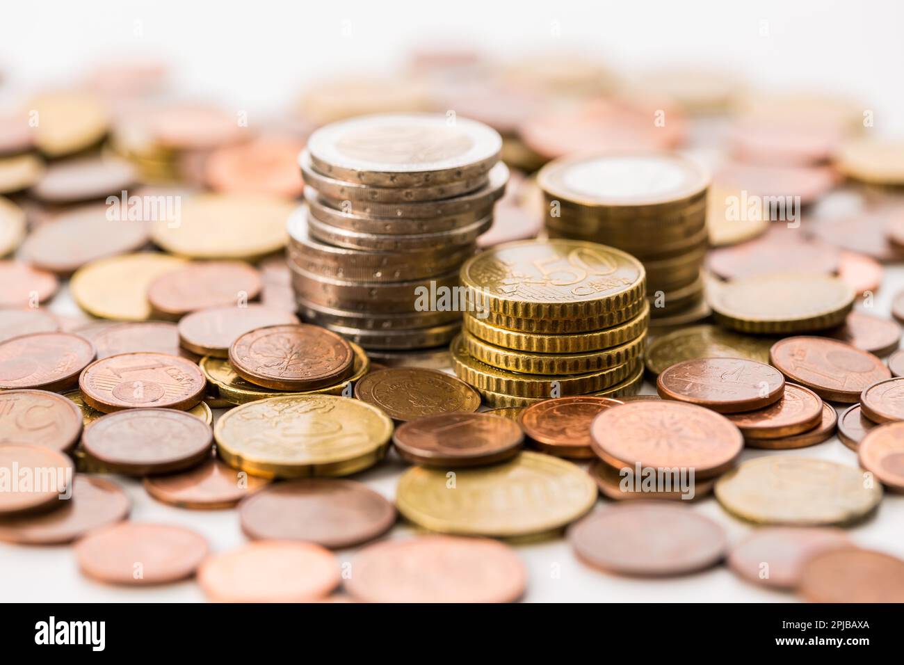 Piles of Euro coins . Money Stock Photo - Alamy