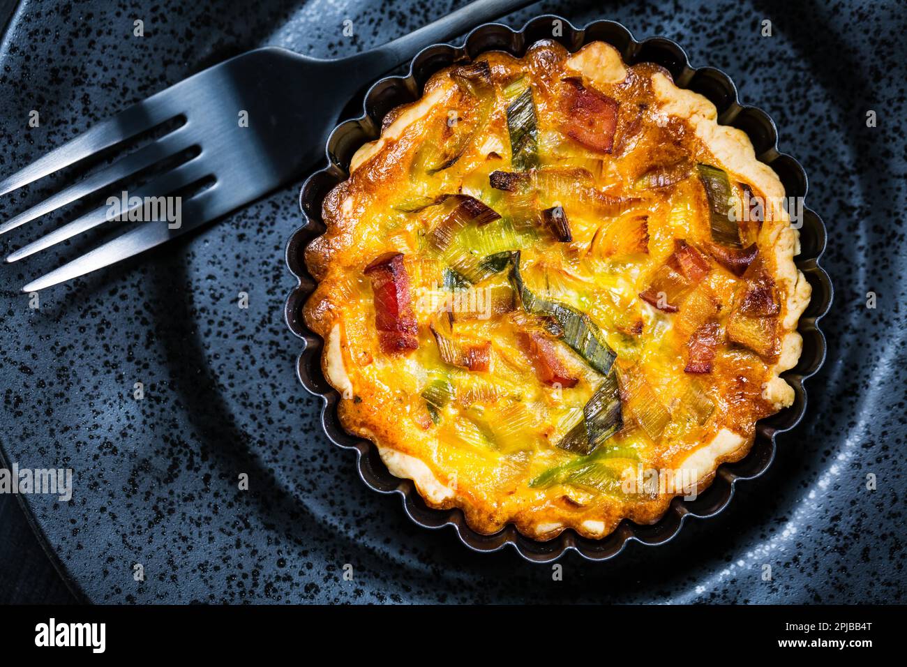 Quiche Lorraine - traditional French tart with pastry crust filled with ...