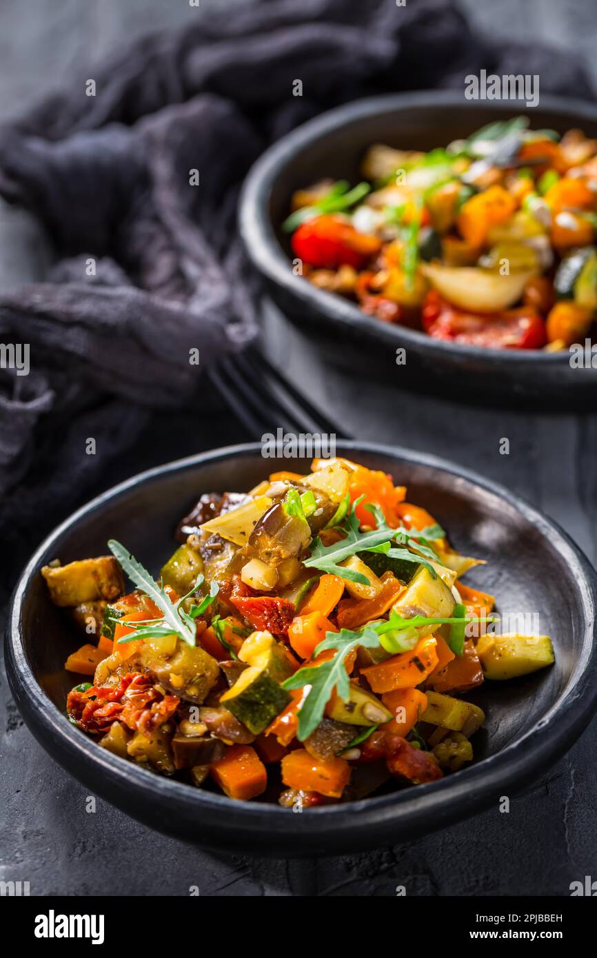 Low carb salad of grilled vegetables with rocket (arugula) and seeds ...