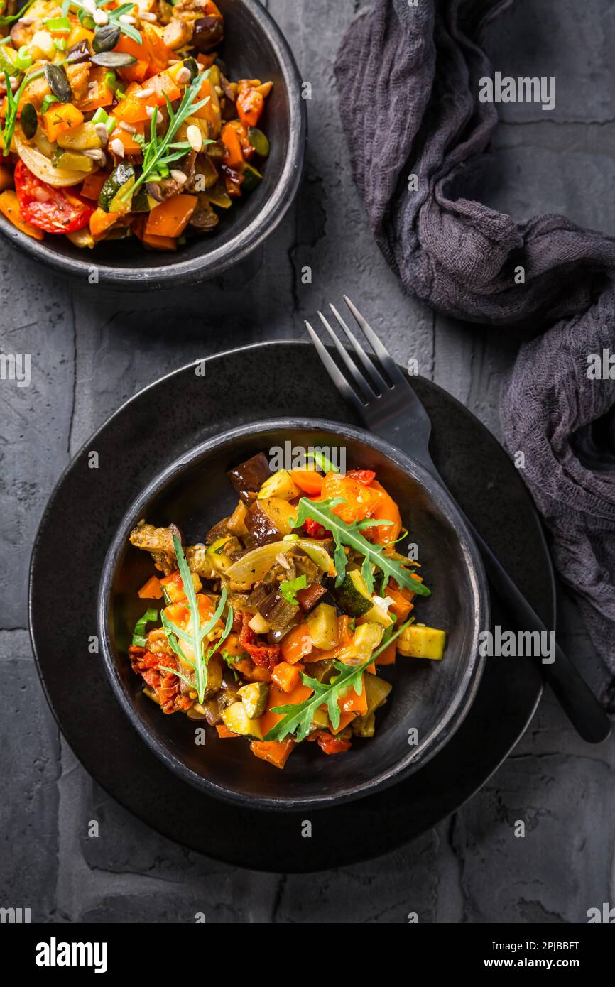 Low carb salad of grilled vegetables with rocket (arugula) and seeds ...
