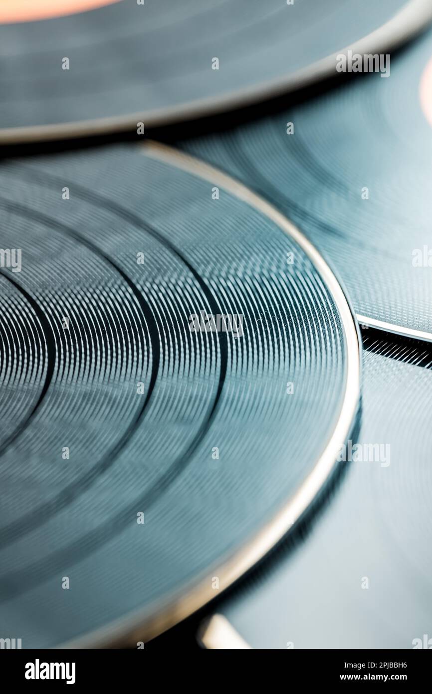 CDs and DVDs in black tone as background. Soft focus Stock Photo - Alamy