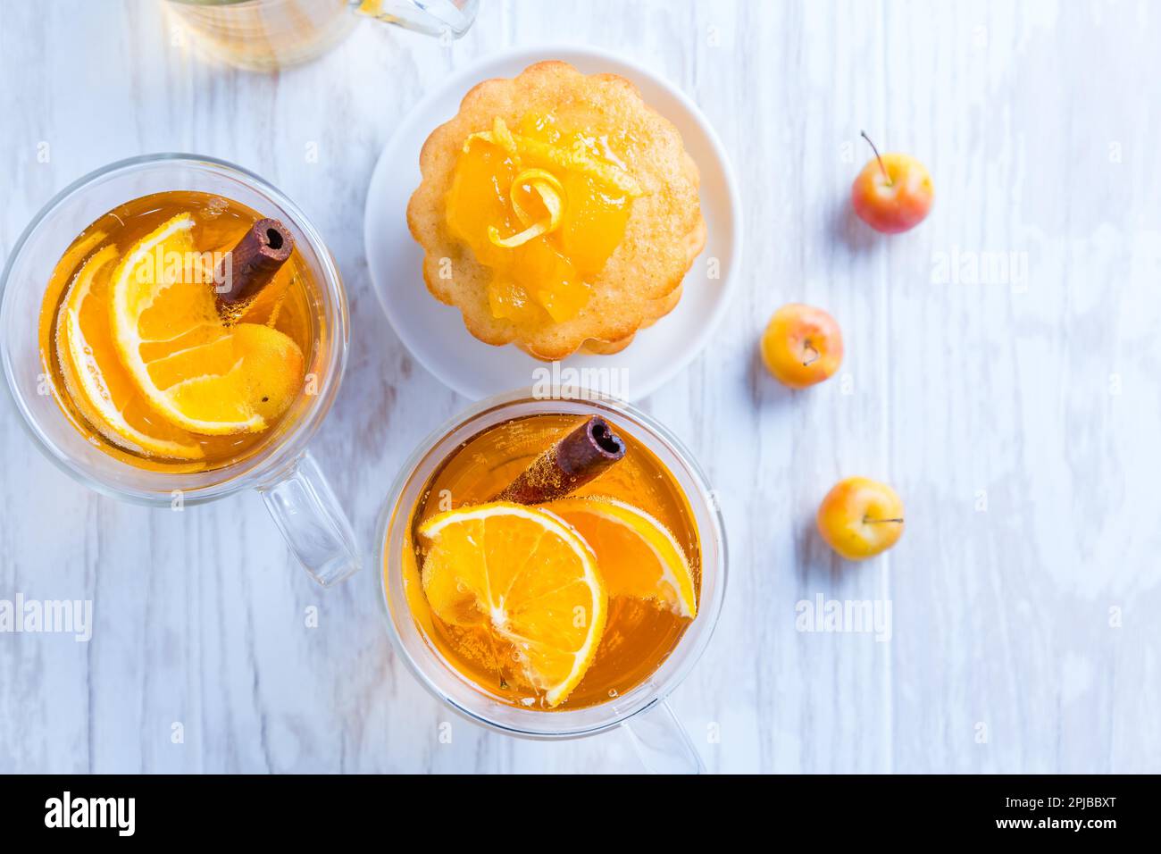 Apple cider cocktail with cinnamon and small lemon curd tarts Mulled ...