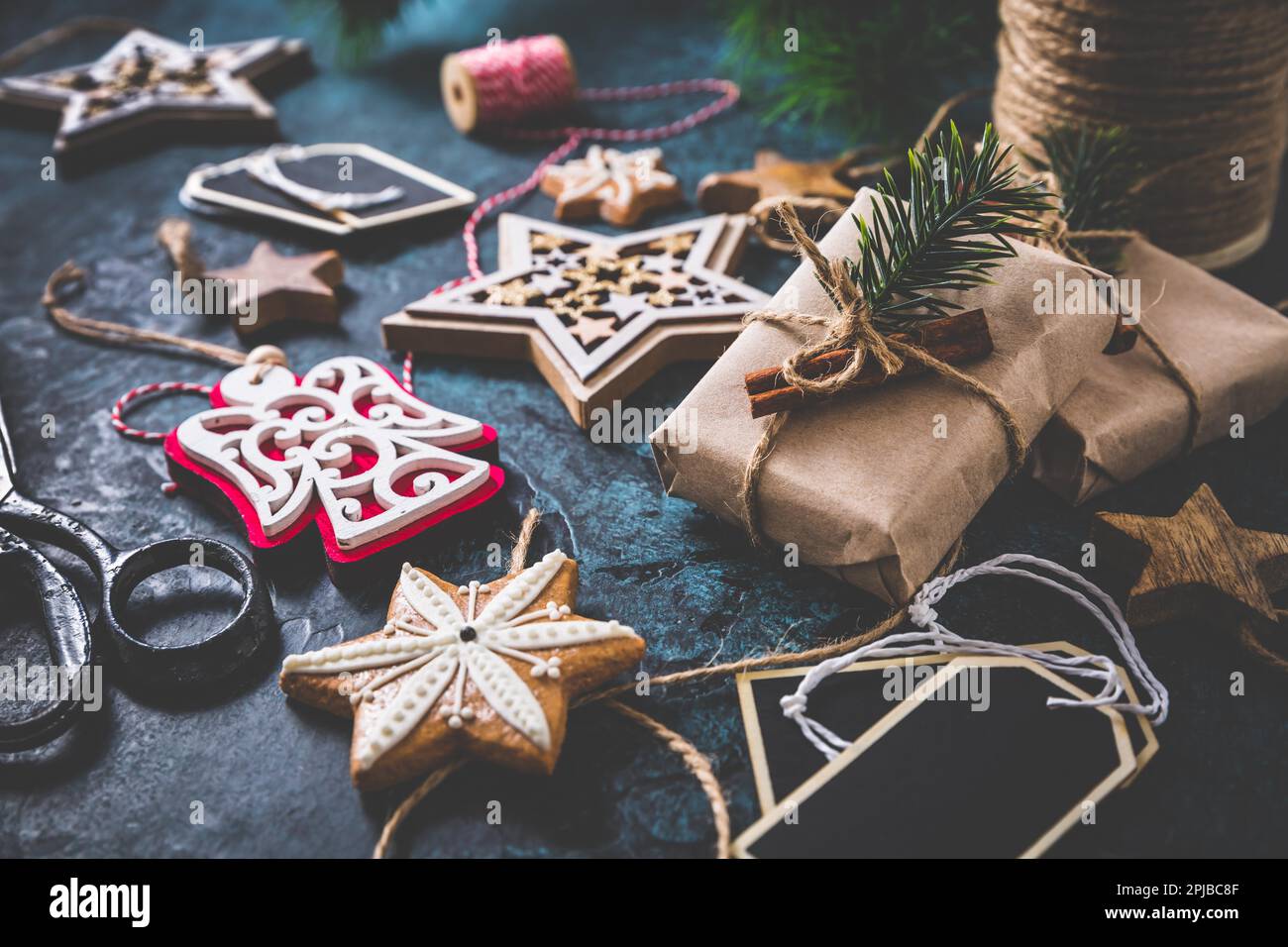 Handmade wrapped christmas gift boxes with decorations and wrapping ...