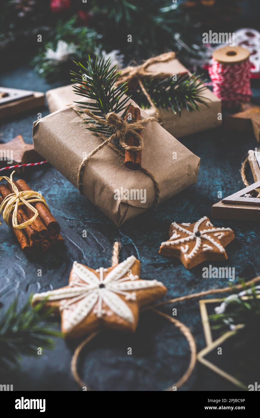 Handmade wrapped christmas gift boxes with decorations and wrapping ...