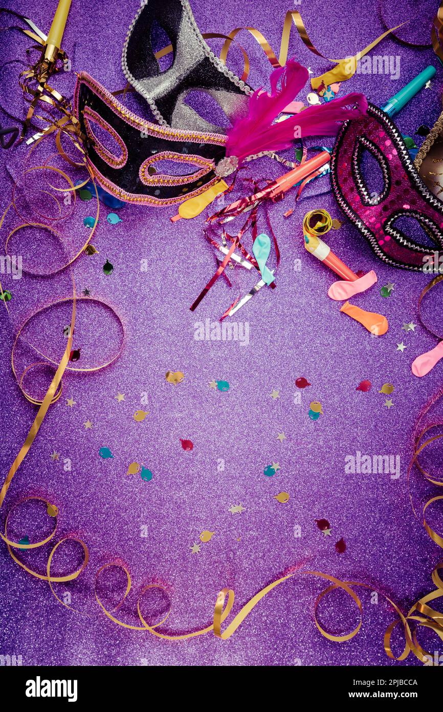Carnival Mask, Streamers And Confetti For Festive Background in violet ...
