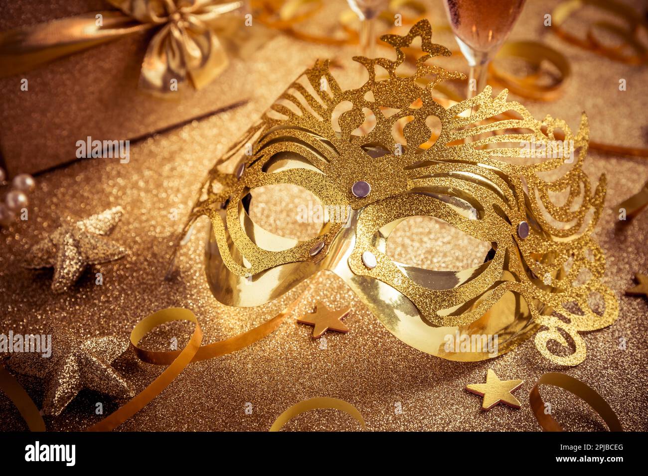 Venetian golden carnival masks on golden background. Concept of mardi ...