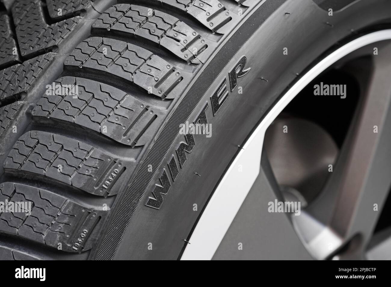 A new complete winter wheel, winter tire with aluminum rim Stock Photo ...