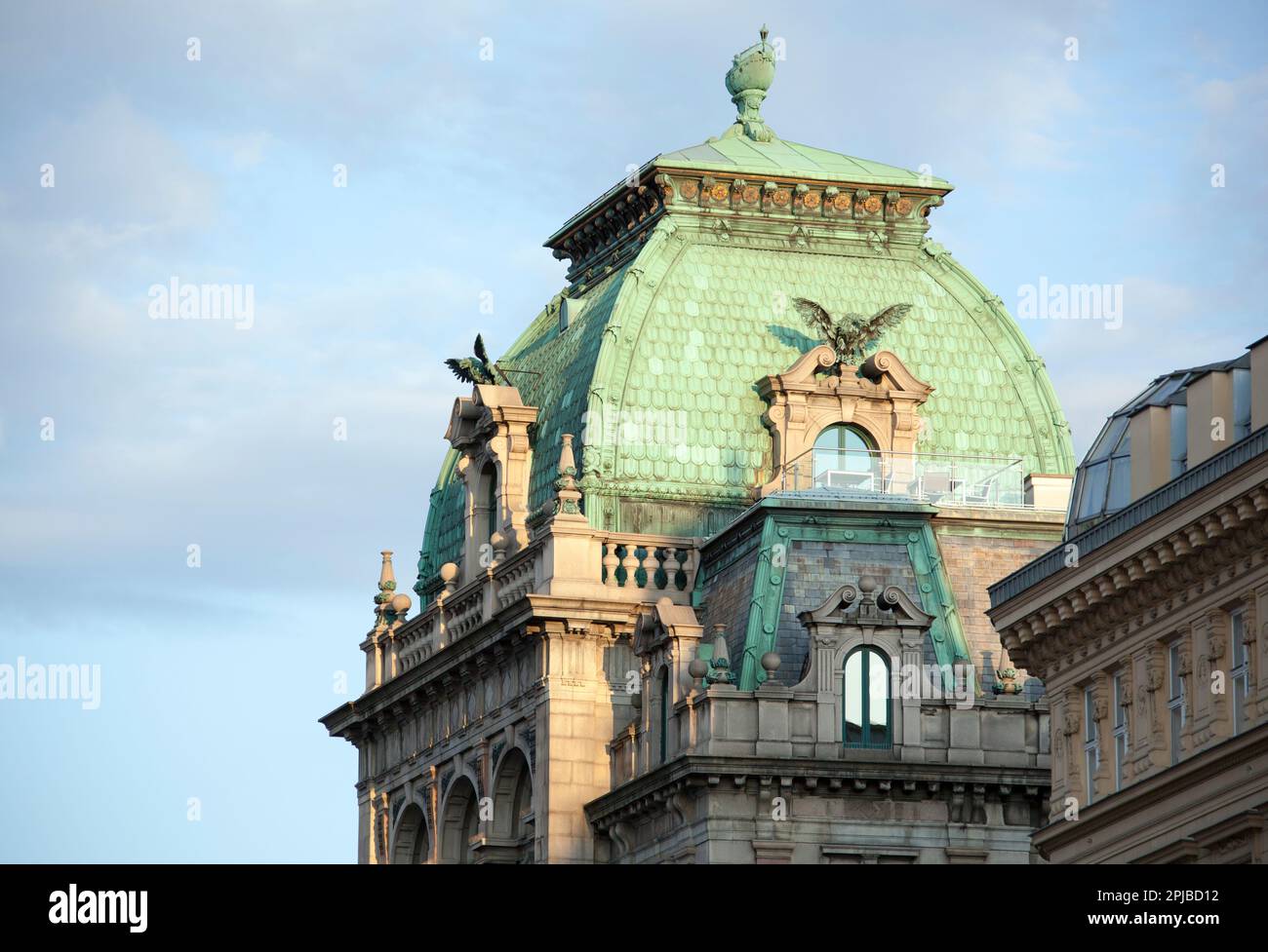 The close view of historic building rooftop and exterior at dusk in ...