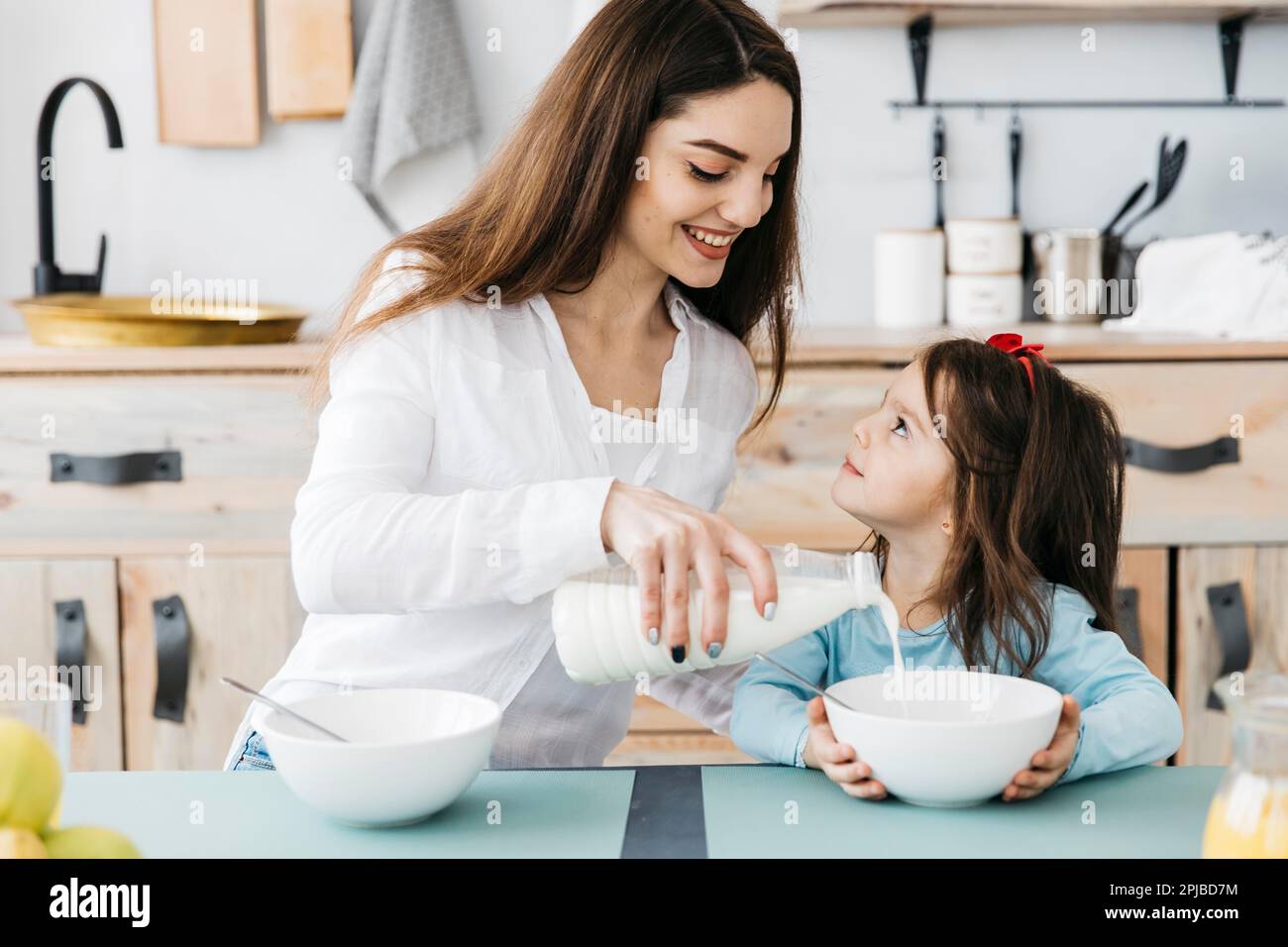 Happy boy having breakfast hi-res stock photography and images - Alamy