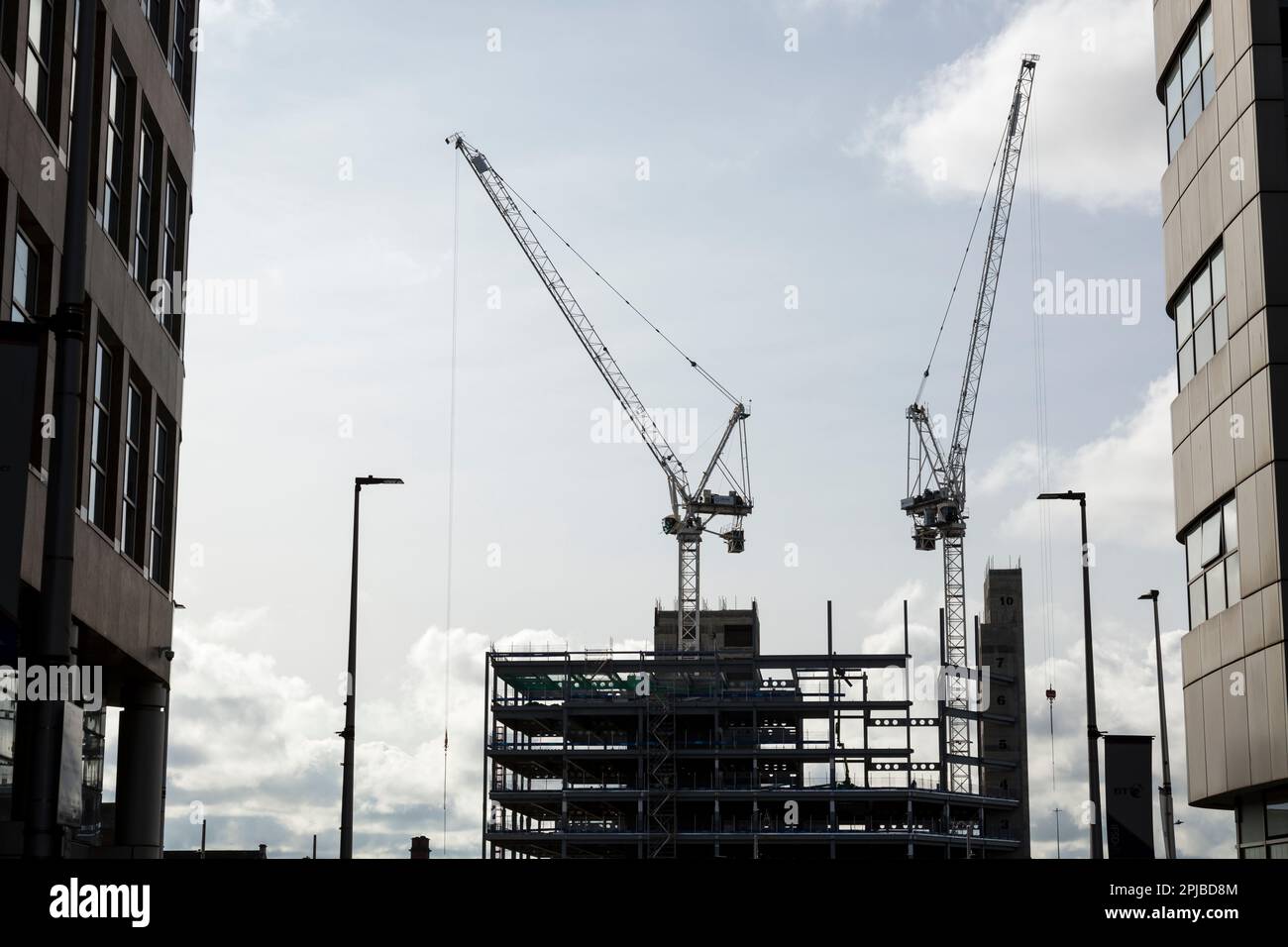 Tower cranes on an office development construction site, Glasgow ...