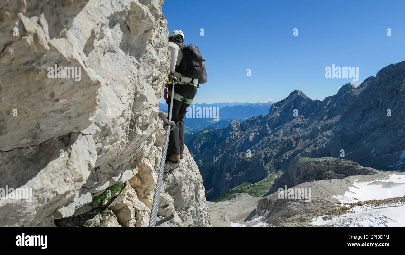 Passage via ferrata with a large exposure and an amazing view of the mountain range and the ...