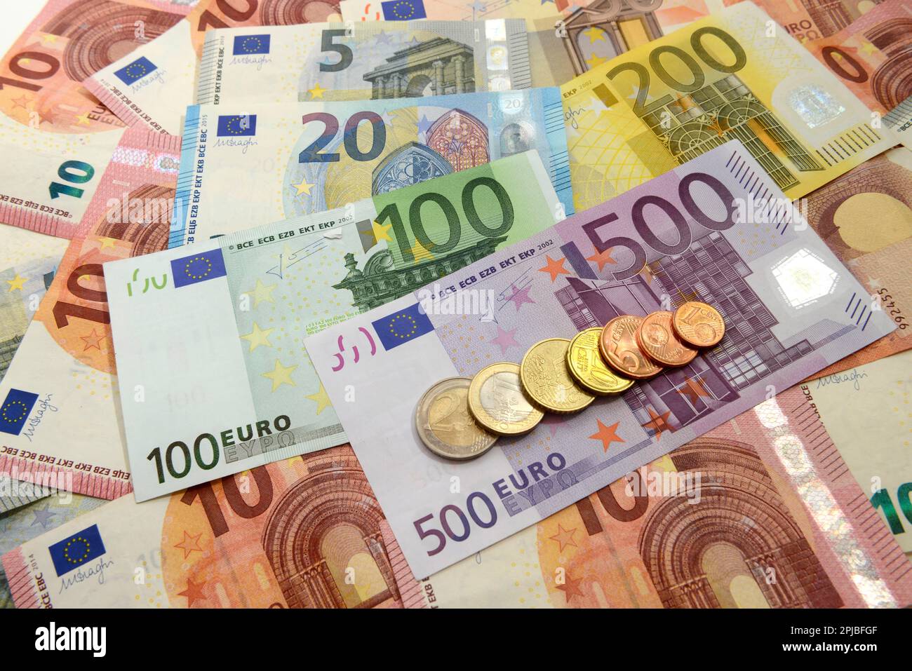 Euro notes, coins Stock Photo - Alamy