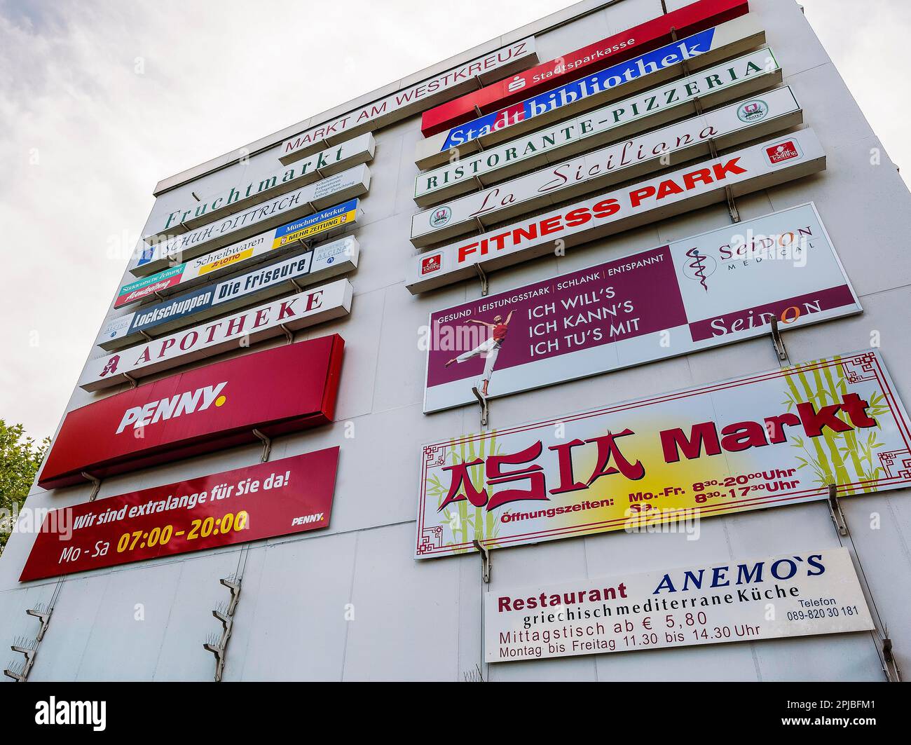 Advertisements on house wall, Markt am Westkreuz, Pasing, Munich ...