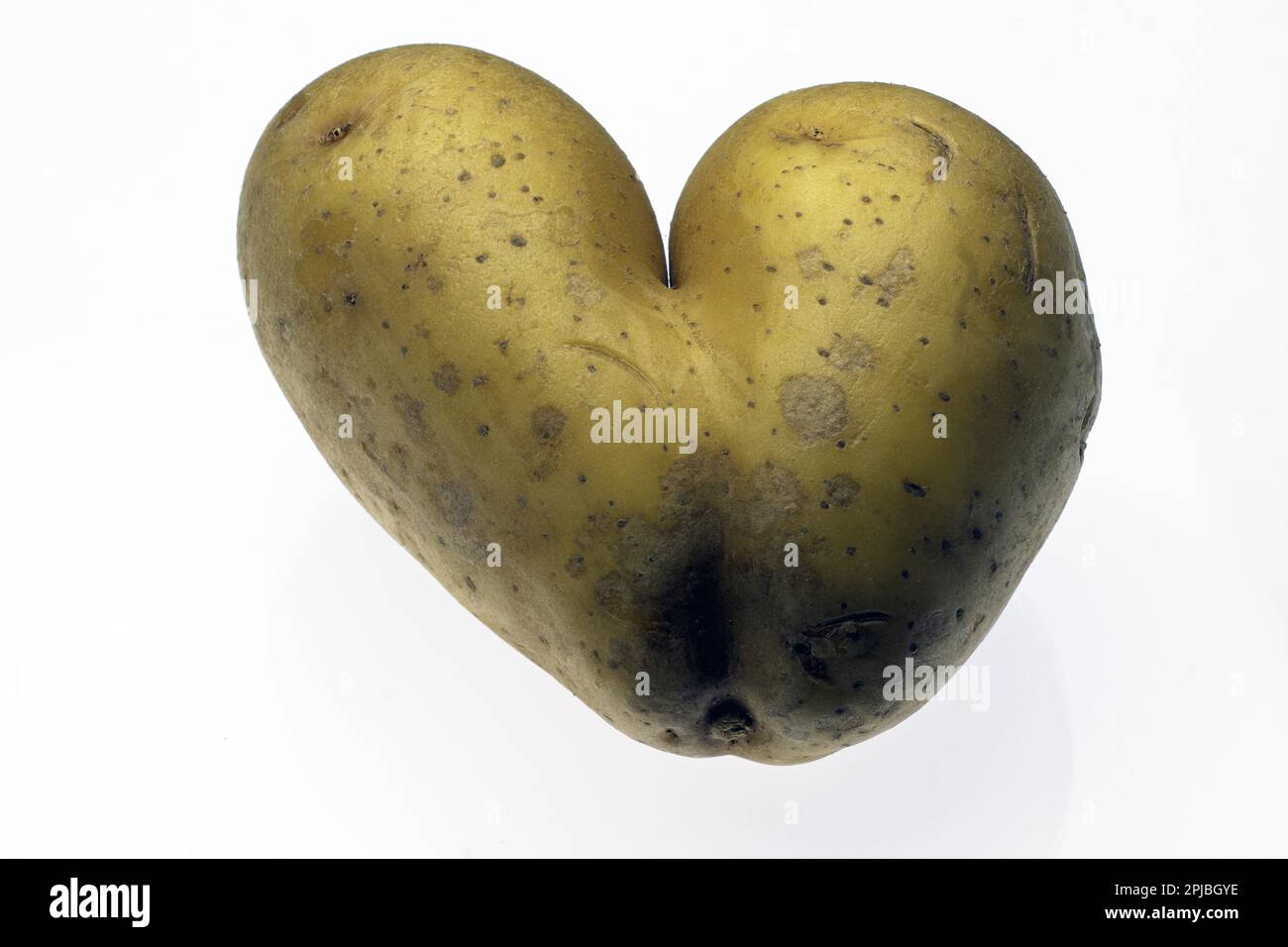 Heart shaped potato Stock Photo - Alamy