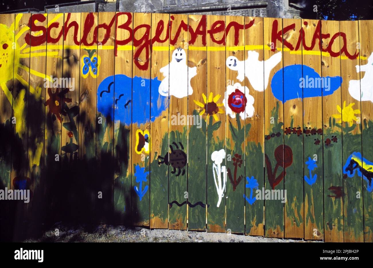 Graffiti on a board wall Stock Photo - Alamy