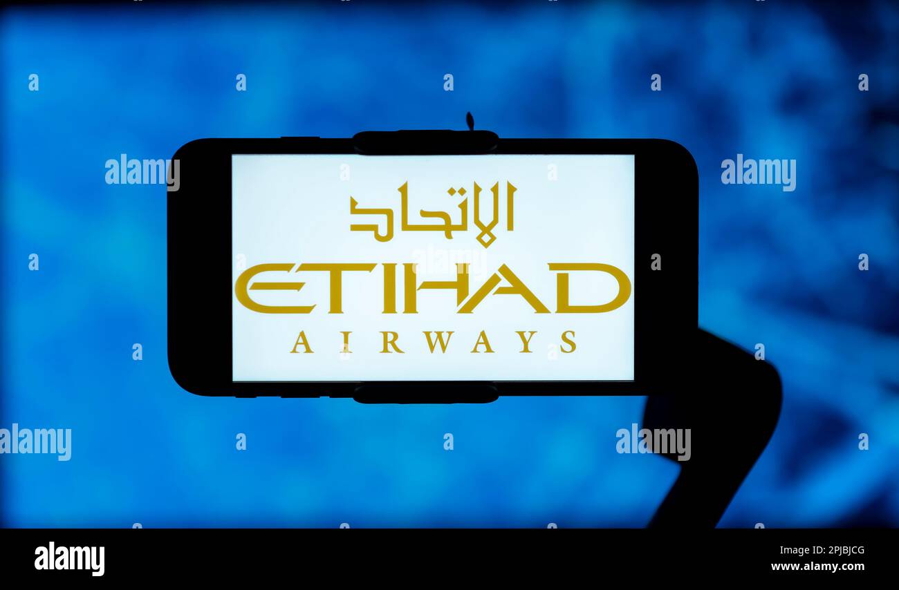 In this photo illustration, the Etihad Airways logo is seen displayed ...
