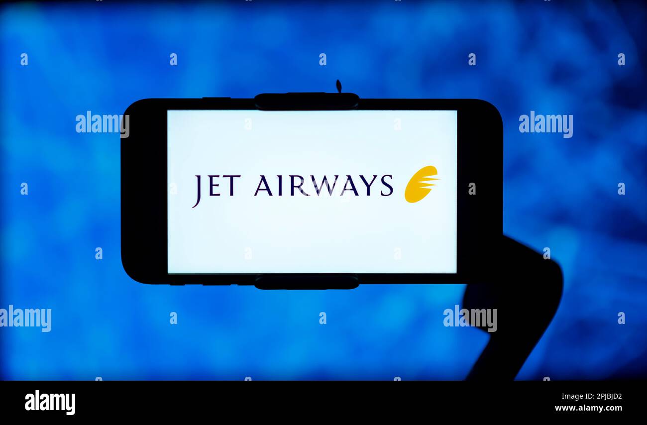 In this photo illustration, the Jet Airways logo is seen displayed on a ...