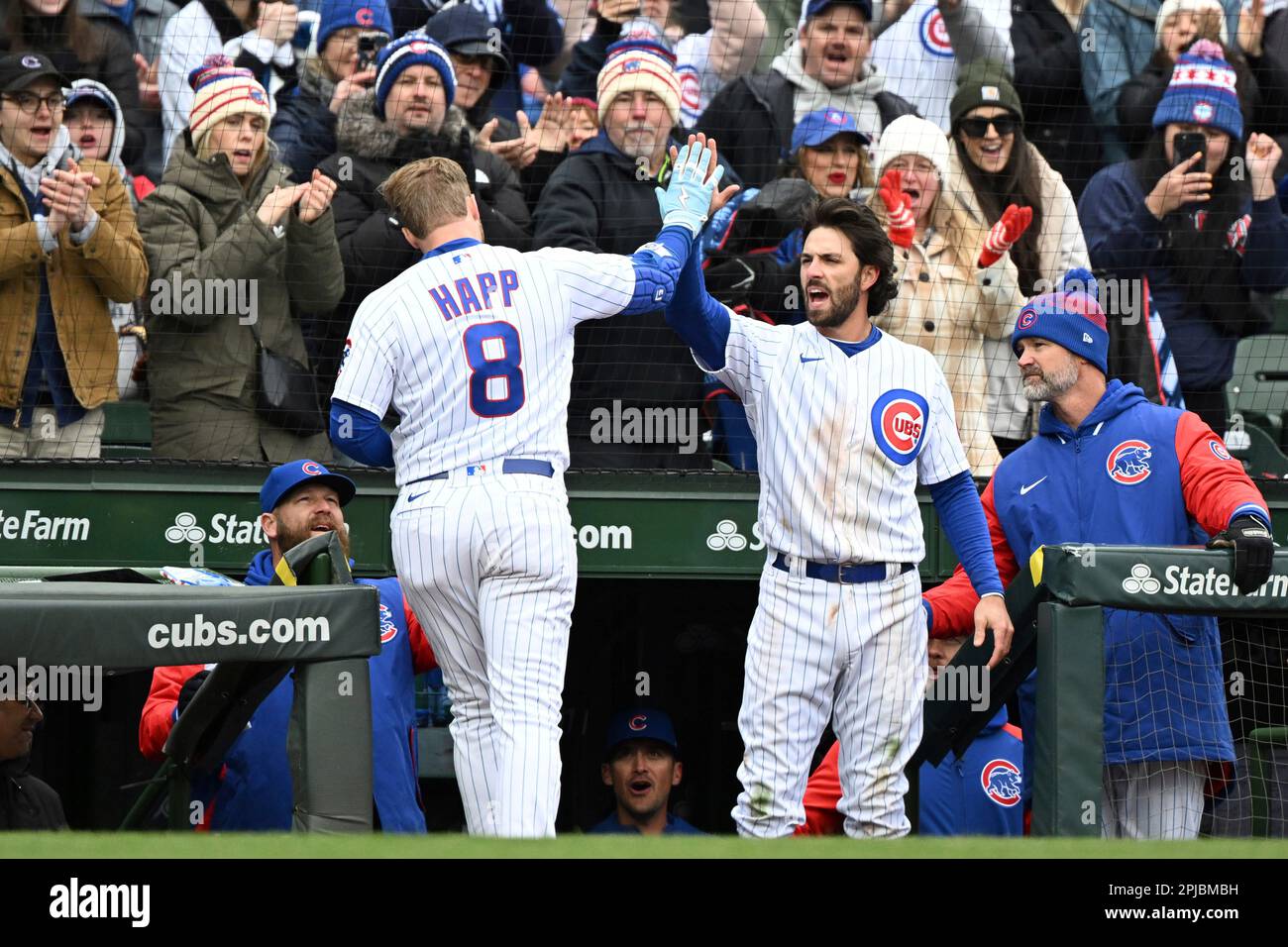 Chicago Cubs Ian Happ (8) is greeted by Dansby Swanson (7) after ...