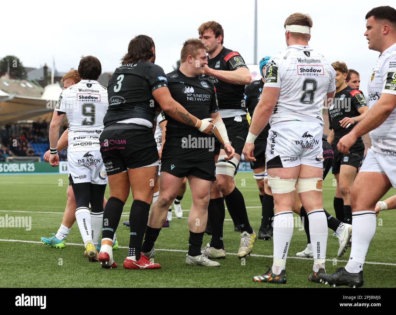 Glasgow Warriors' Johnny Matthews (centre) celebrates scoring his side ...