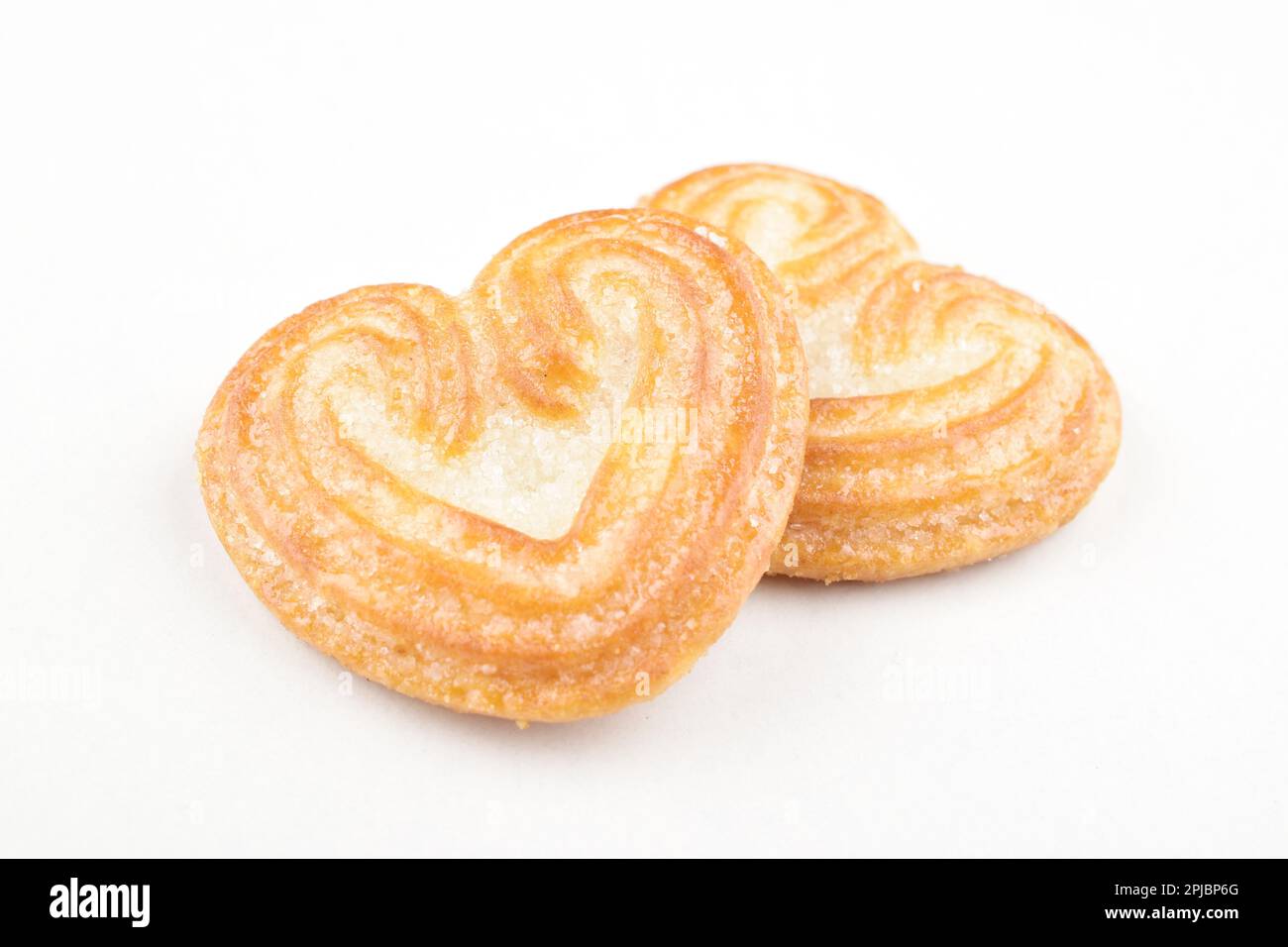 Heart shaped biscuit isolated on white background Stock Photo - Alamy