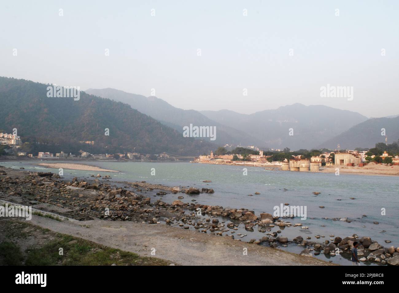 Winter view of ganga riverside at rishikesh Stock Photo - Alamy