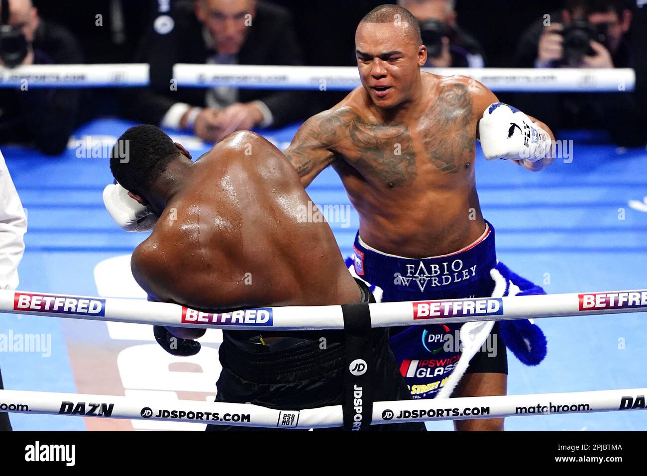 Fabio Wardley (right) strikes Michael Polite-Coffie in the vacant WBA ...
