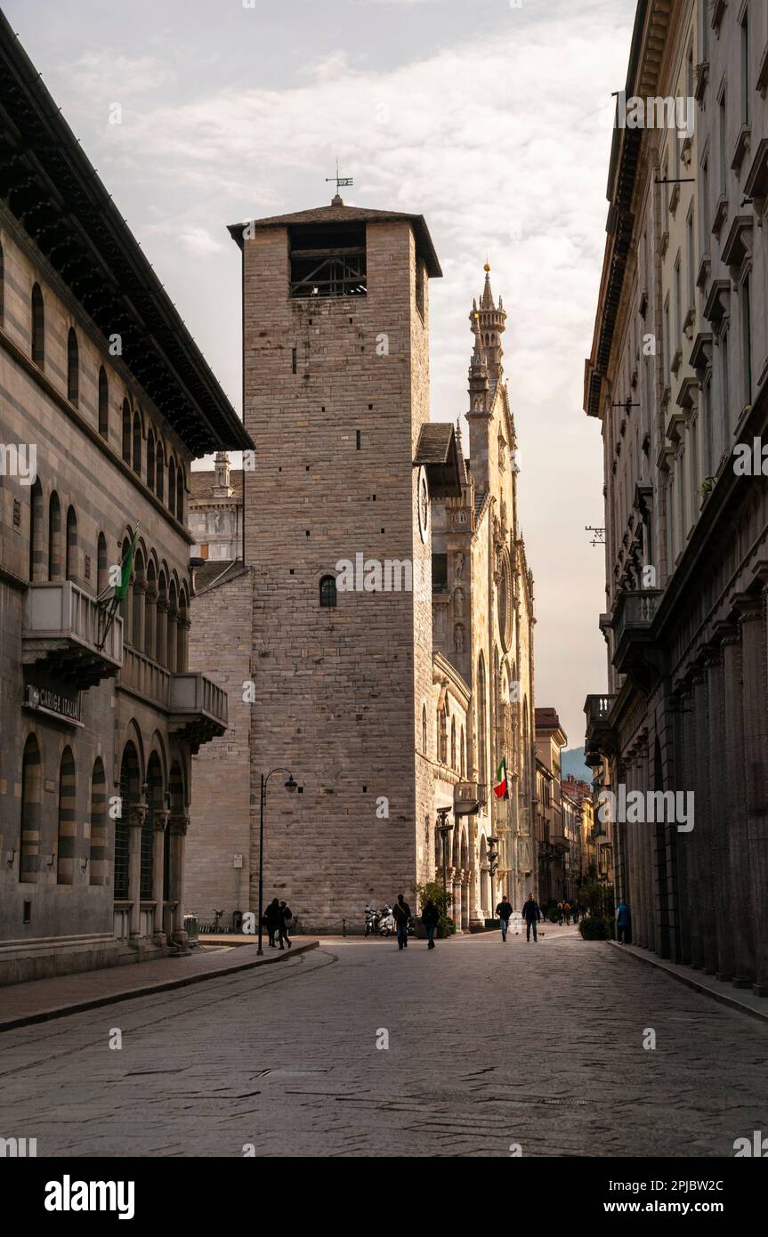 Romanesque tower and Gothic facade of the Como Cathedral and Broletto ...