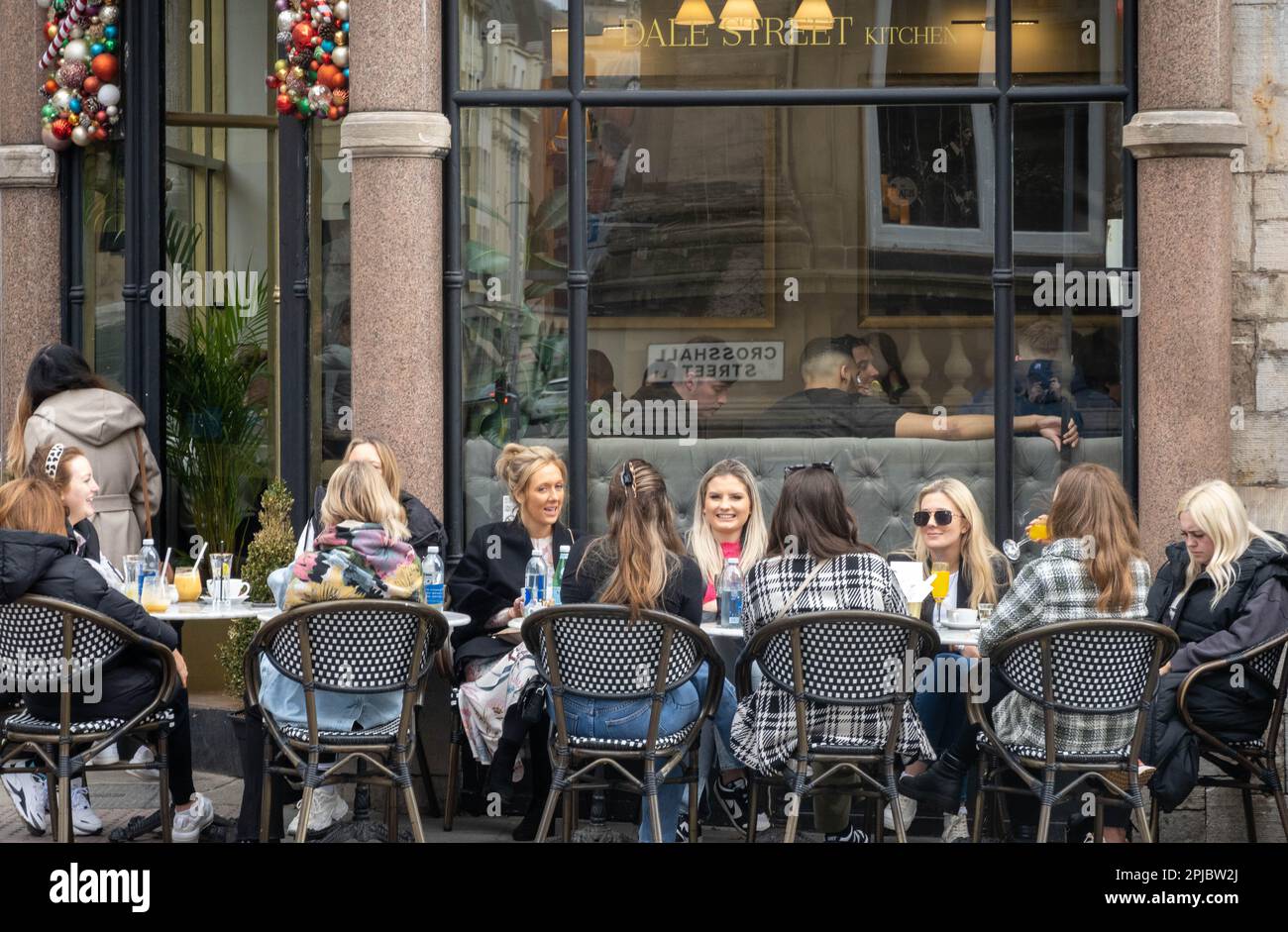 A group of female friends enjoying at drink together at Dale Street ...