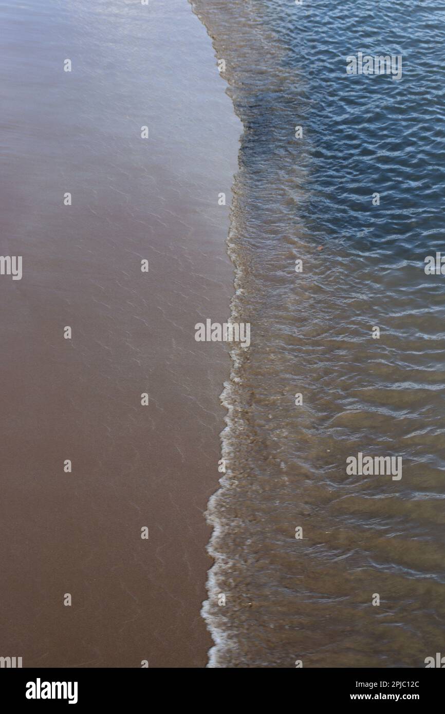 Water and sand abstract Stock Photo - Alamy