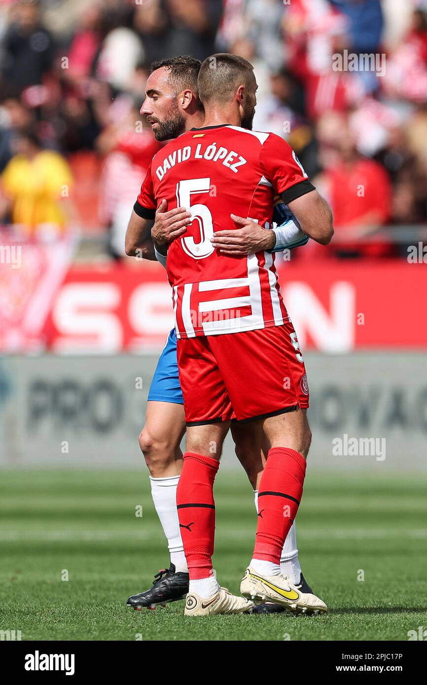 GIRONA, SPAIN - APRIL 1: David Lopez of Girona FC with Sergi Darder of ...