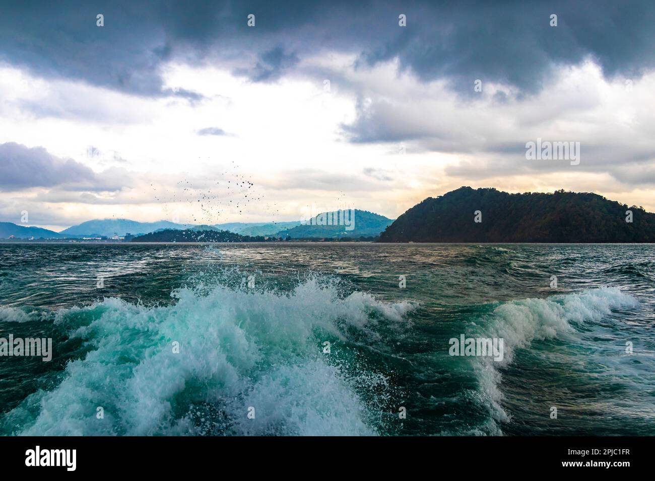 Travel by ferry boat longtail boat yacht and high waves through ...