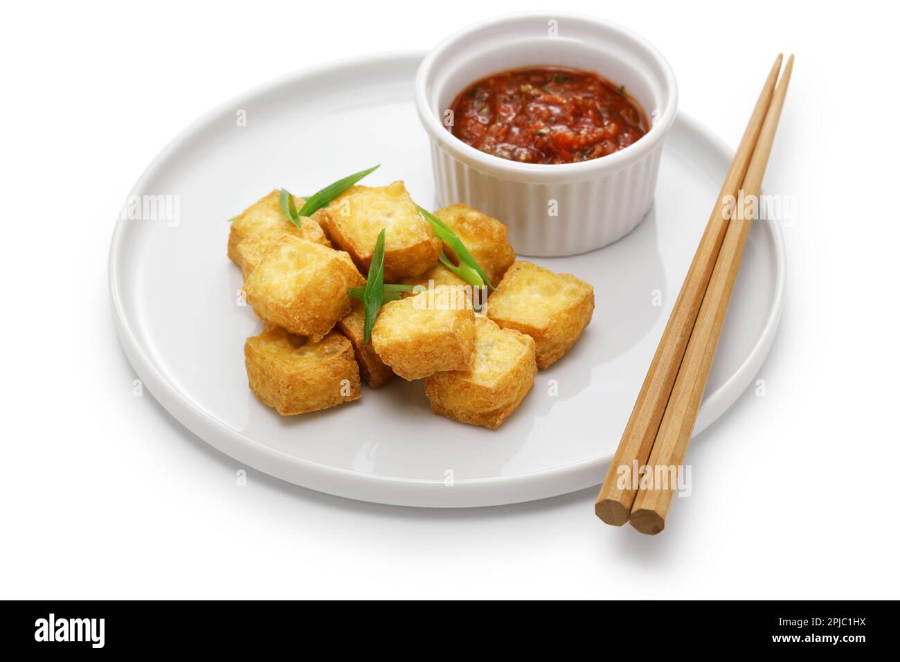 crispy cubed tofu puffs with chili sauce Stock Photo - Alamy