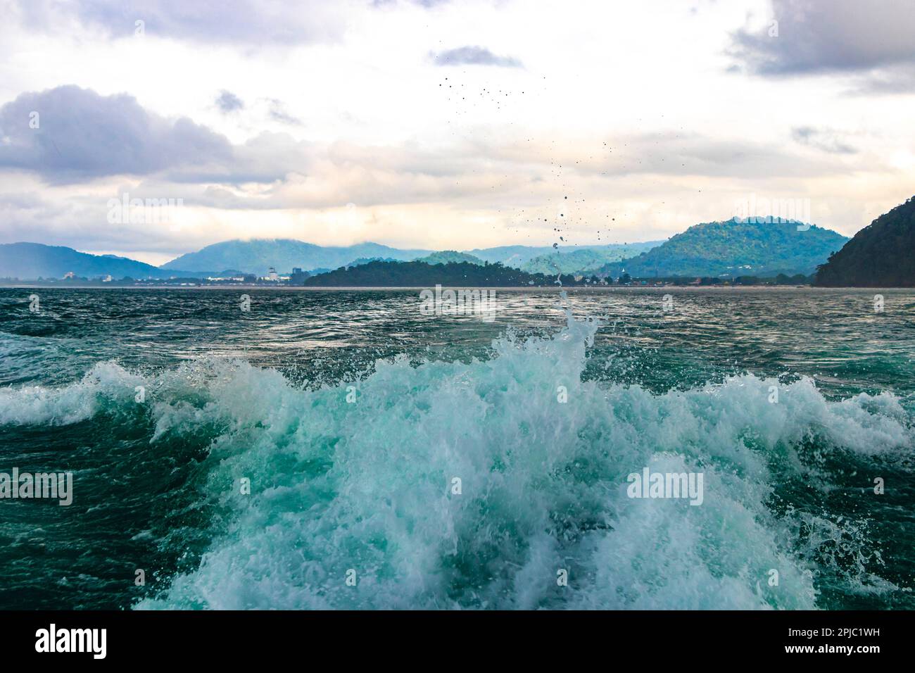 Travel by ferry boat longtail boat yacht and high waves through ...
