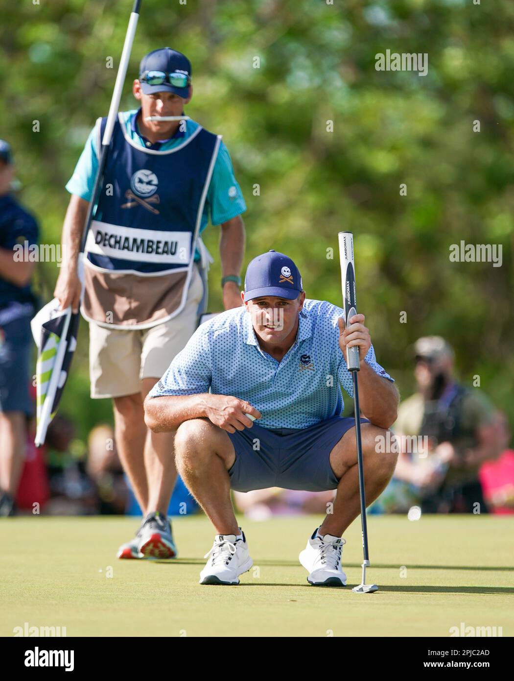 Orlando, Florida, USA. 31st Mar, 2023. Captain Bryson DeChambeau (R) of ...